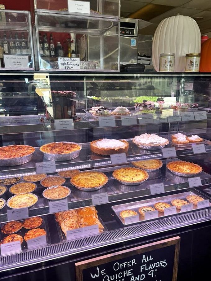 Pie-fection in sight! This display case is like a museum of edible art, showcasing quiches that could make a French chef weep with envy.