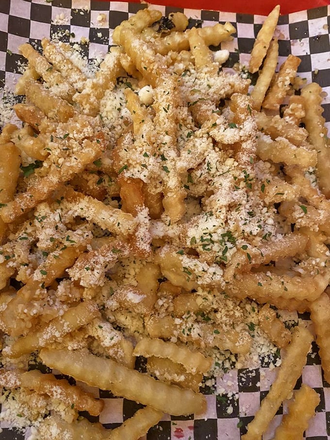 Garlic Parmesan fries that make you question your loyalty to ketchup&mdash;a crispy, cheesy, herb-dusted revelation that deserves its own fan club.