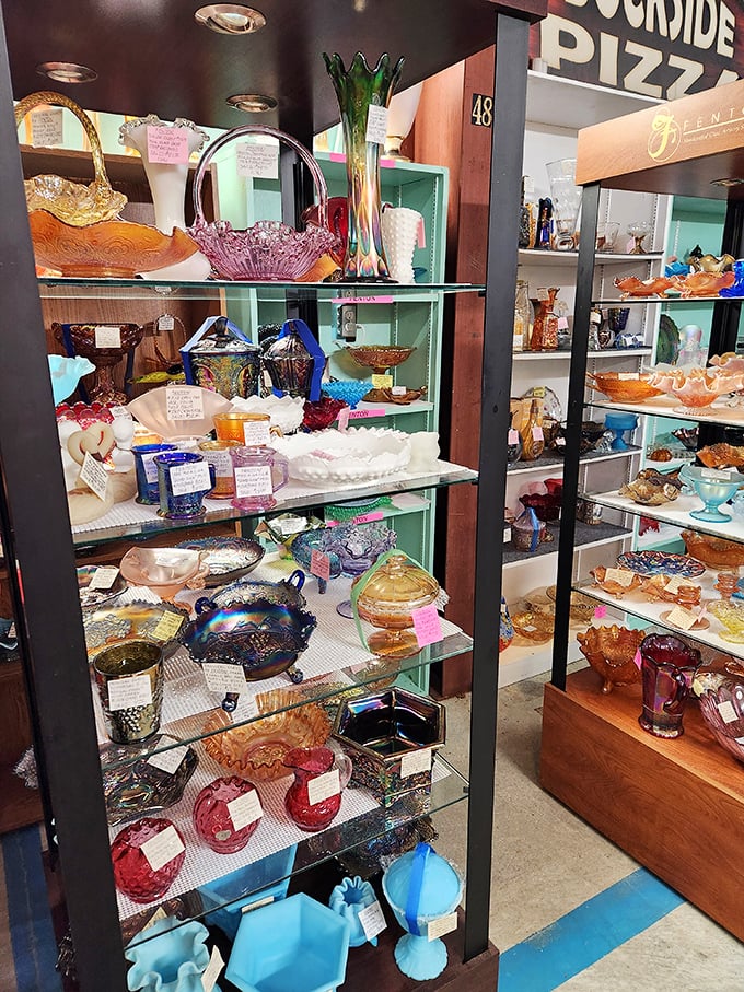 Glass menagerie or thrifter's paradise? These shelves sparkle with potential – just don't play baseball in here, kids!