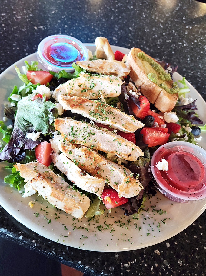 Who said salads can't be exciting? This grilled chicken salad is like a garden party where all the cool veggies decided to show up.