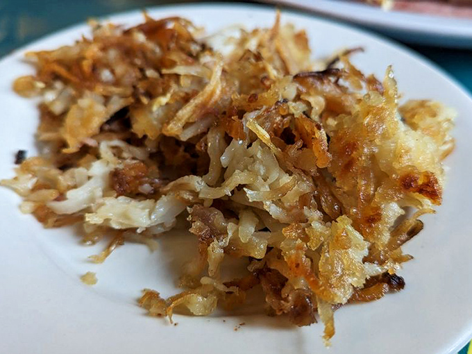 Hash browns or modern art? These crispy, golden shreds are a canvas of breakfast possibilities. Jackson Pollock would be proud.