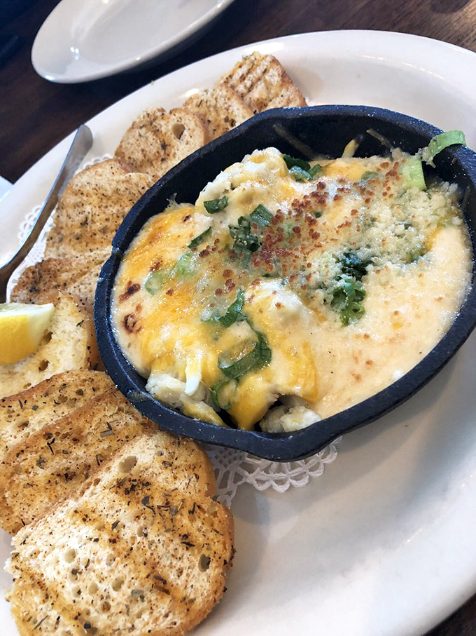 Bubbling, golden, and oh-so-tempting. This hot crab dip is what seafood dreams are made of. Grab a chip and dive in!