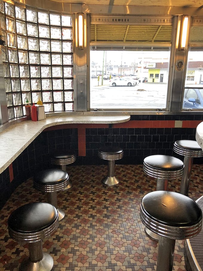 Window seat to burger paradise! These stools offer front-row tickets to the sizzling show on the grill. Dinner and a view!