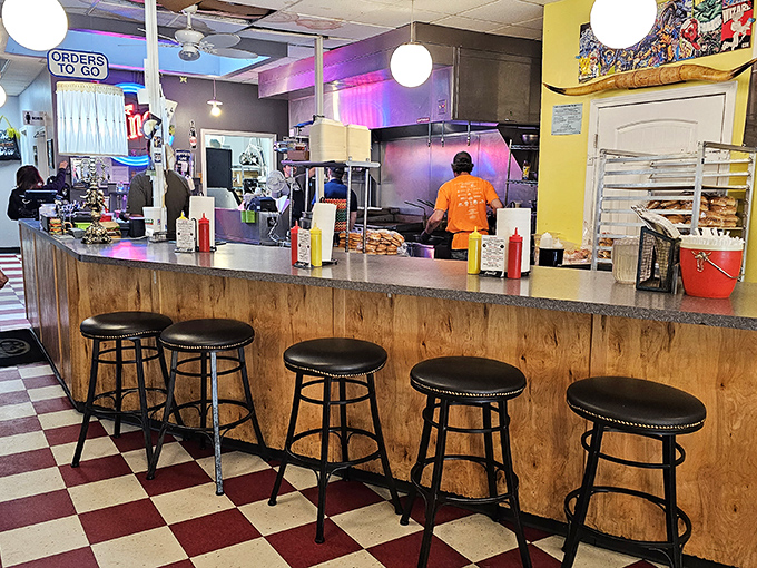 Retro chic meets burger boutique! The Burger Dive's interior is a feast for the eyes, with enough neon to light up a small city.