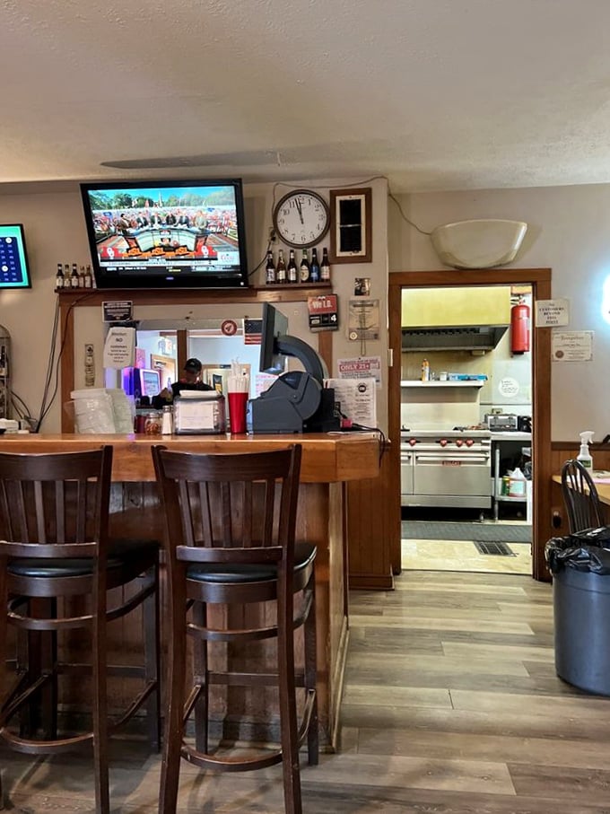 Where the magic happens! This kitchen may not be fancy, but it's cranking out pizzas that could make a Neapolitan chef question their life choices.