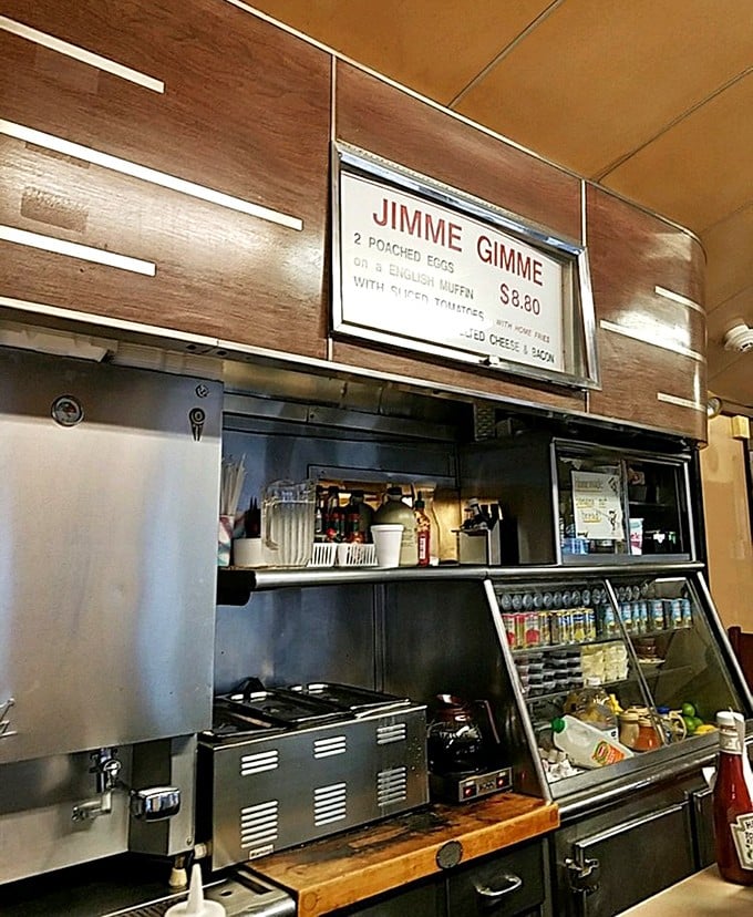The sign says it all: "JIMMIE GIMME." Two words that have launched a thousand breakfast pilgrimages to this hallowed diner.