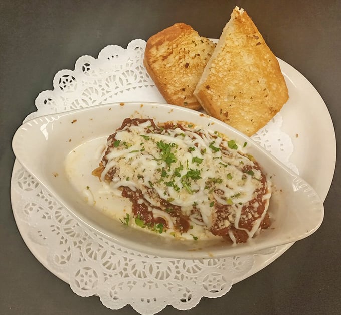 Layer upon layer of cheesy, saucy goodness. This lasagna is like a warm, comforting blanket for your stomach.