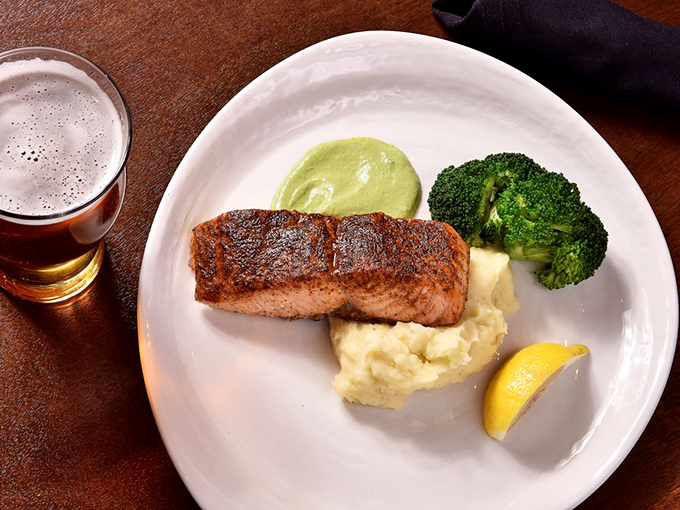 This salmon's golden sear could make jewelry designers jealous, resting on cloud-like mashed potatoes with broccoli standing at attention nearby.