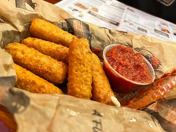 Mozzarella sticks: Crispy on the outside, gooey on the inside. It's like a cheese hug for your mouth!