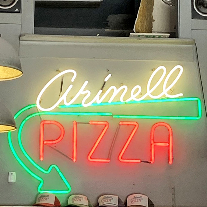 Neon dreams do come true! Arinell's sign is like a beacon of hope for hungry pizza pilgrims.