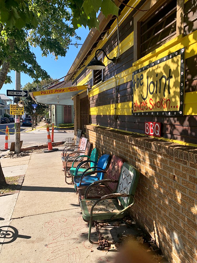 Outdoor seating that's pure New Orleans: a little weathered, a lot charming, and 100% ready for your barbecue feast.