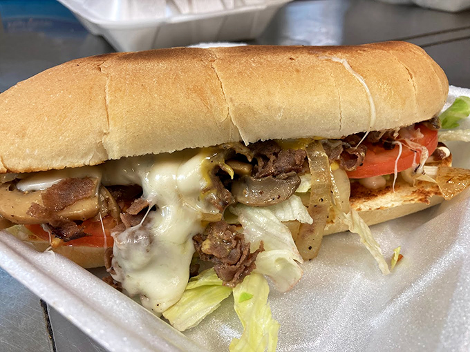 Philly meets Bama in this cheesesteak that's cheesier than a '80s sitcom. It's a sandwich that bridges the Mason-Dixon line with deliciousness.