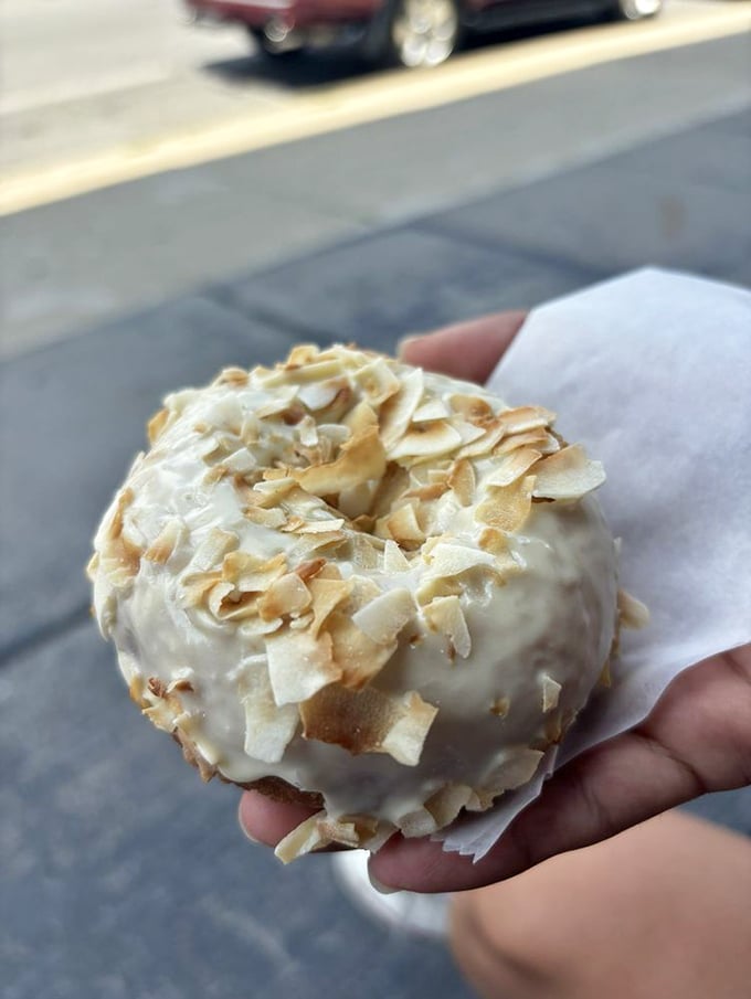 Tropical vacation in donut form! One bite of this pineapple coconut creation, and you'll swear you hear ukuleles in the distance.