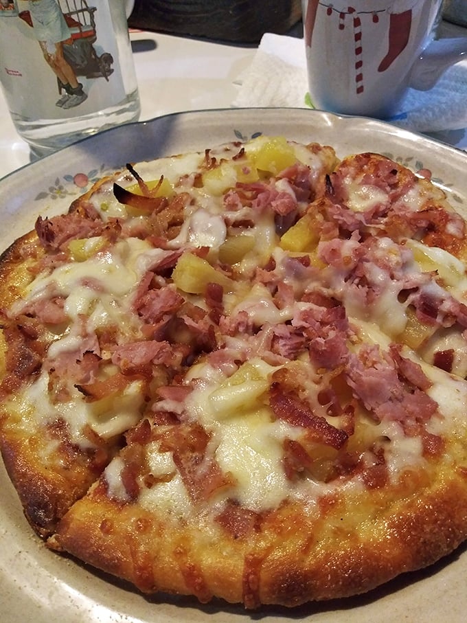 Pizza that's more loaded than a baked potato at a steakhouse. Each bite is a flavor explosion that'll make your inner Italian sing opera.