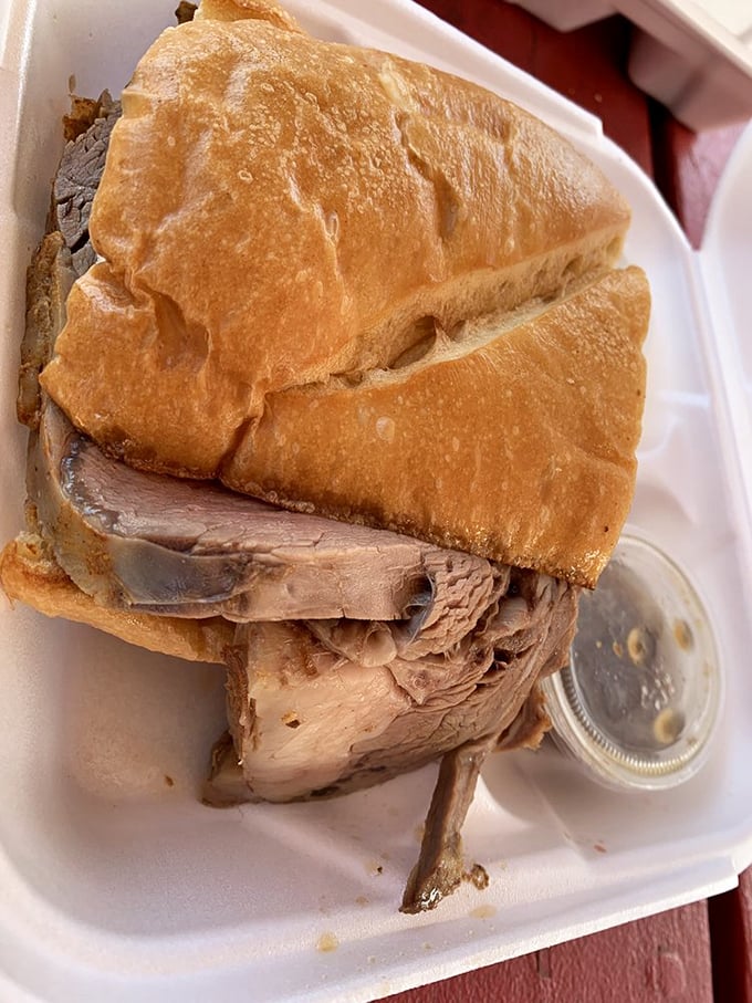 Prime rib sandwich: where deli meets steakhouse in a handheld flavor explosion. No utensils required for this meaty masterpiece.