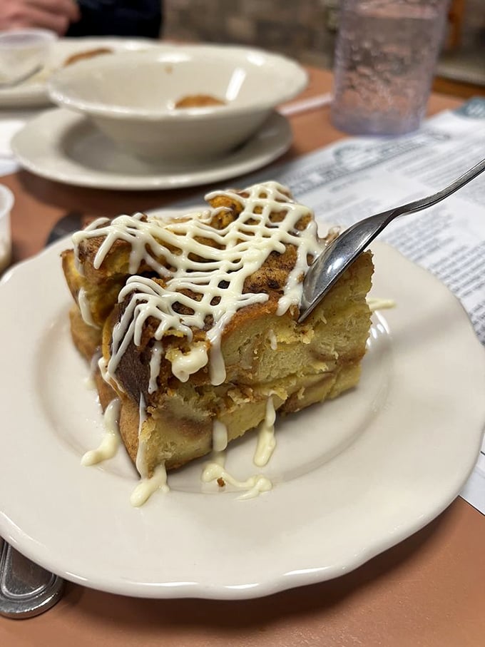 Pumpkin Bread Pudding: autumn on a plate. It's like a warm, spicy hug that'll make you want to jump in a pile of leaves.