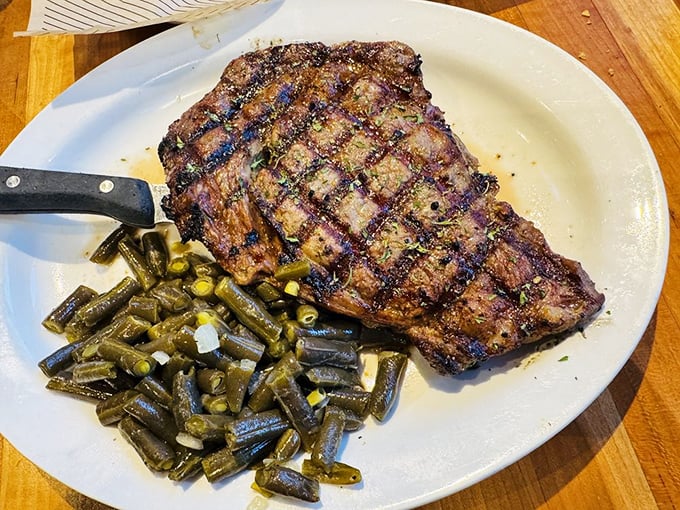 A ribeye with perfect grill marks and green beans on the side&mdash;sometimes the classics become classics because they're just that good.
