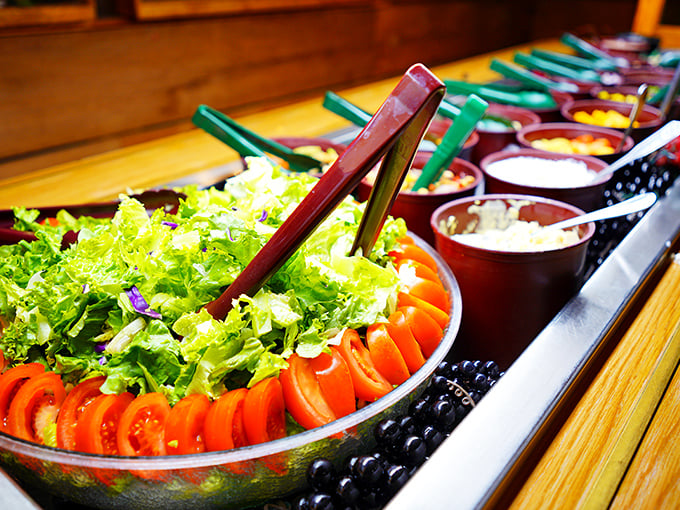 Behold, the salad bar of champions! It's so fresh and colorful, it could make a rabbit consider moving to Alaska.