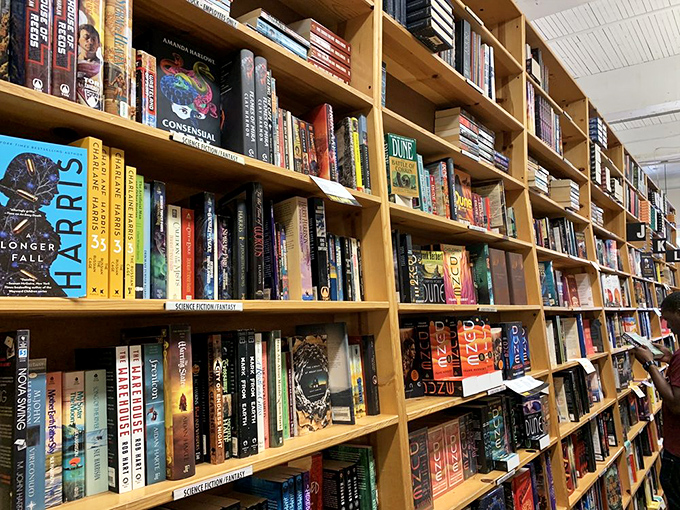 Sci-Fi section: where imagination takes flight and gravity is optional. It's like space travel, but your feet stay firmly on Powell's floors.