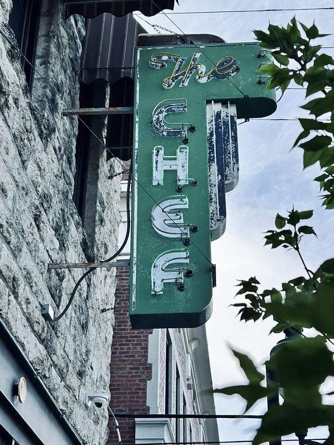 The Chef's iconic sign: A beacon of hope for the hungry. It's not just a sign; it's a promise of deliciousness that's stood the test of time.