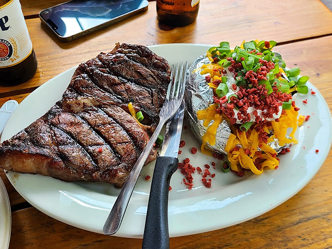 Steak so perfectly grilled, it could make a vegetarian weep. Paired with a loaded spud that's living its best life.