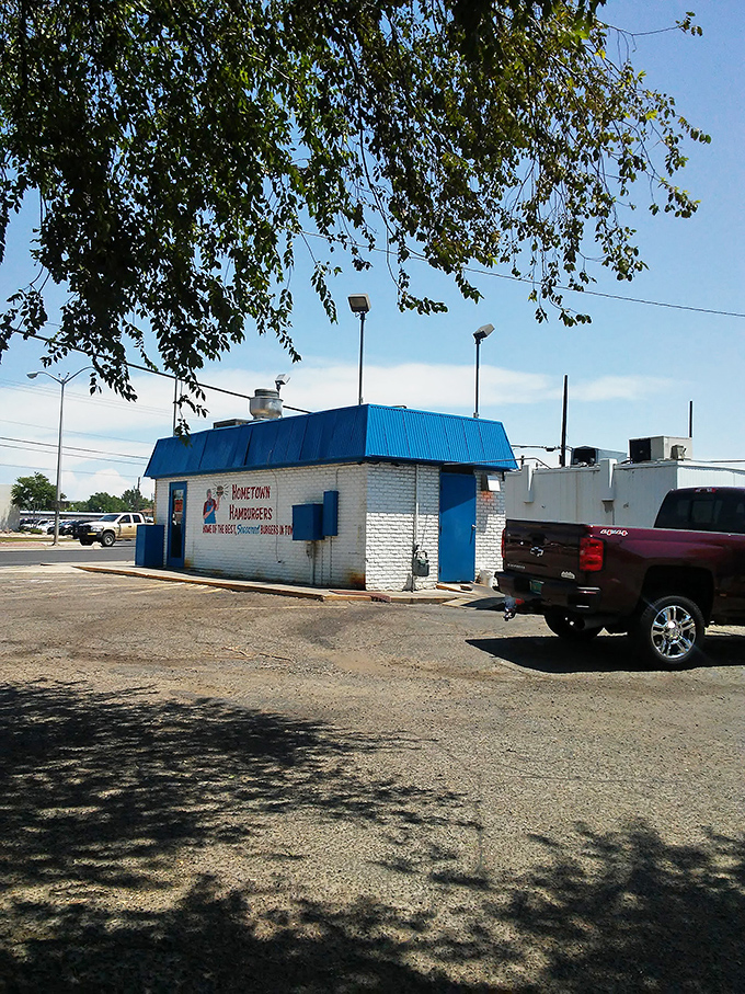 A blue-roofed oasis in a sea of asphalt. Hometown Hamburgers: where burger dreams come true.