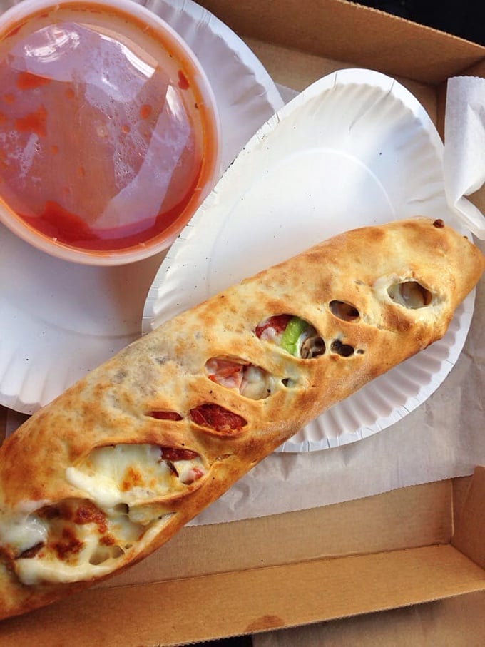 The Stromboli: Where pizza decided to get fancy and roll itself up like an edible sleeping bag of deliciousness.