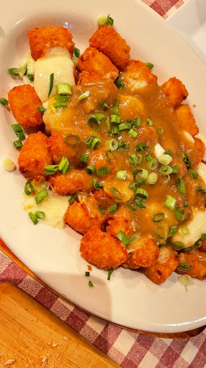 Tater tot poutine? Be still, my carb-loving heart! This indulgent twist on a Canadian classic is pure, cheesy, gravy-soaked bliss.