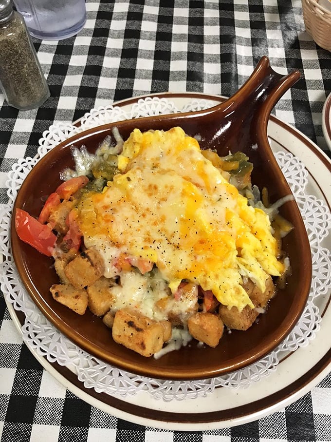 Eggs-cellent choice! This veggie skillet is a garden party in a pan, topped with enough cheese to make Wisconsin proud.