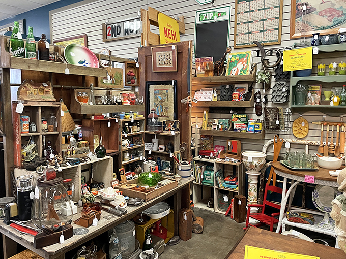 Holy tchotchkes, Batman! This booth is bursting with more knick-knacks than you can shake a vintage stick at. It's a treasure hunter's paradise!