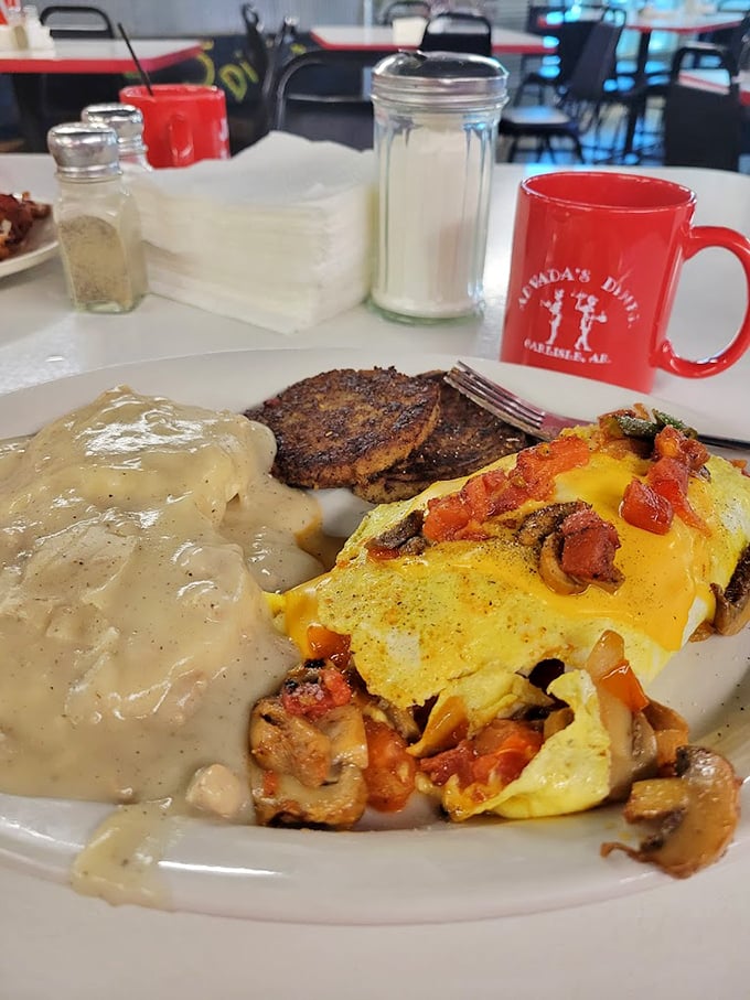 That omelet isn't just stuffed&mdash;it's having an identity crisis about whether it's breakfast or a complete three-course meal. The gravy settles the debate.