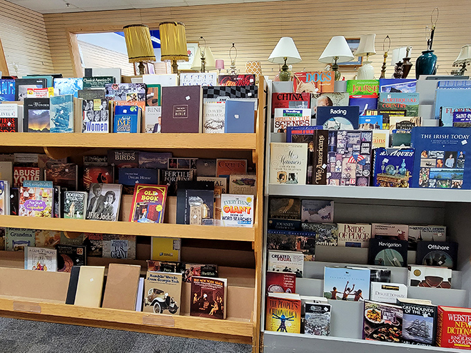 Coffee table books stacked like treasure chests of knowledge. That "JUST" spine peeking out seems to whisper, "Just one more book won't hurt."