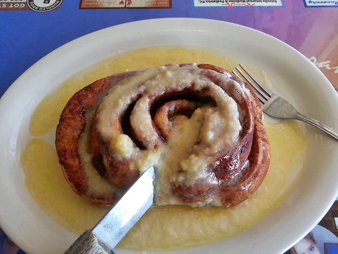 Behold, the cinnamon roll of your dreams! This gooey, glazed beauty is big enough to share, but you won't want to.