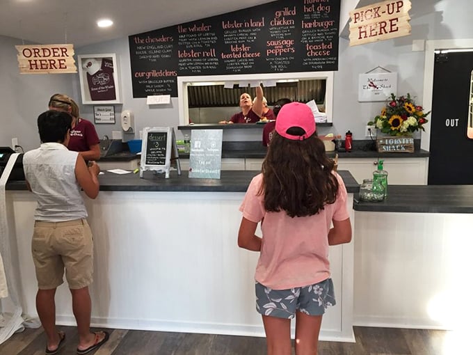 The excitement at this counter is palpable. It's like watching kids line up for ice cream, except the "kids" are adults, and the "ice cream" is lobster.