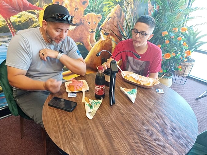Cinnamon roll diplomacy in action! Nothing brings people together quite like sharing a table and a plate of frosted happiness.