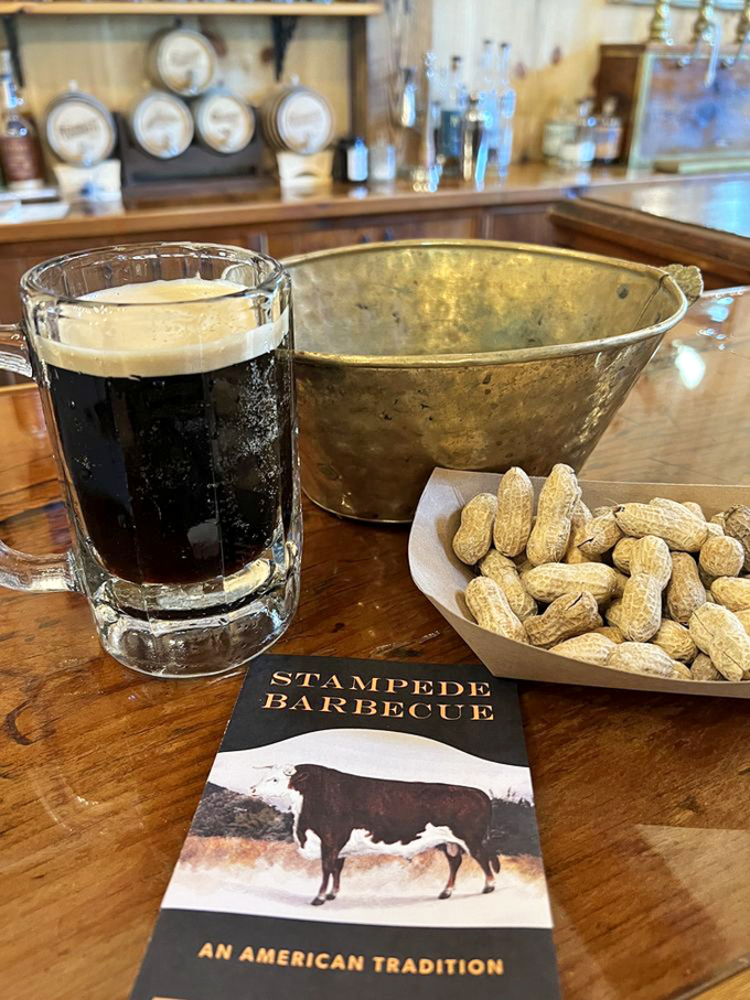 Cheers to good taste! A frosty brew, crunchy peanuts, and a menu that screams "American tradition" - talk about a triple threat.