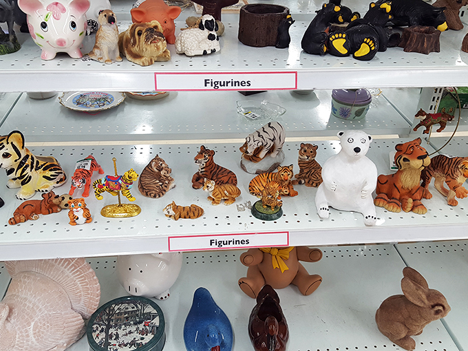 It's a menagerie of miniatures! These figurines are ready to add a touch of whimsy (or weirdness) to any shelf. Choose wisely, they're watching you.