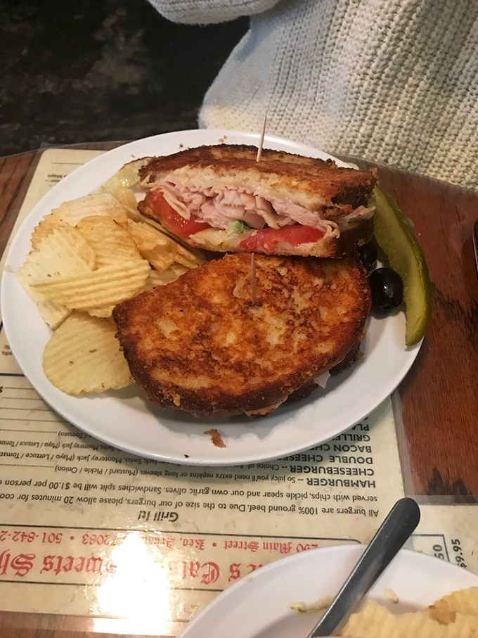 This grilled turkey sandwich has more layers than a Tennessee Williams play, and twice the satisfaction. The pickle is just showing off.