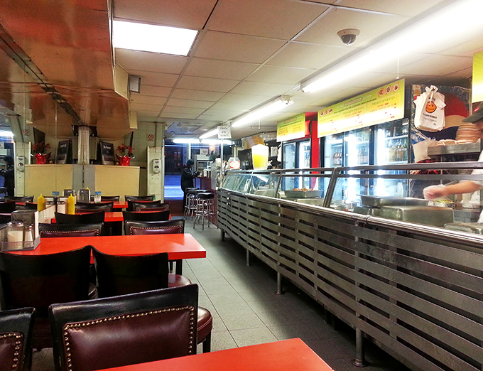 Where magic happens and calories fear to tread. The counter's sizzle and steam create a culinary theater worthy of Broadway.