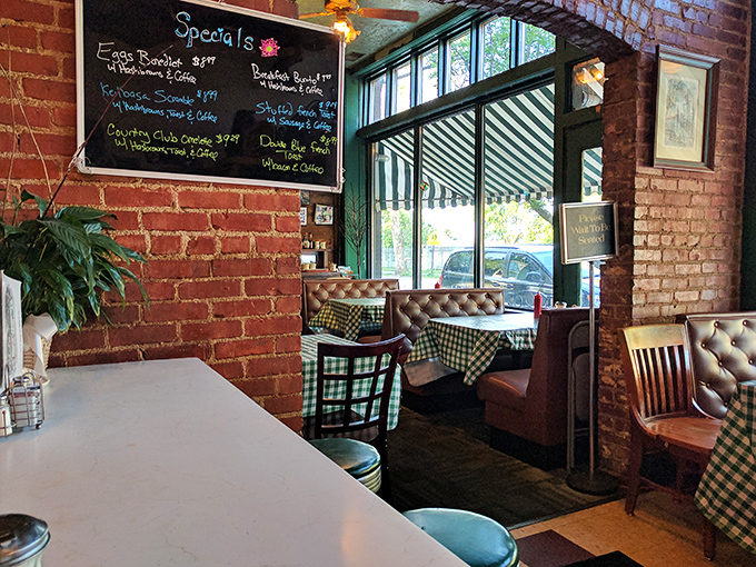 A feast for the eyes! The cafe's rustic charm, complete with exposed brick and chalkboard specials, sets the stage for culinary adventures to come.