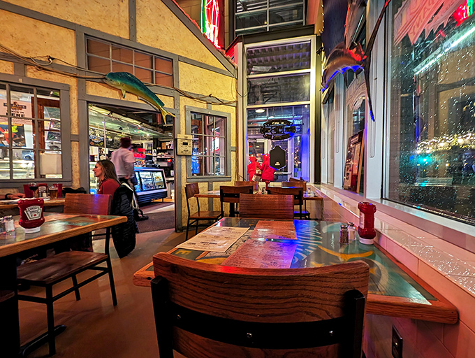 Dining room or maritime museum? With fish-shaped lamps and colorful buoys, it's a feast for the eyes and the taste buds.