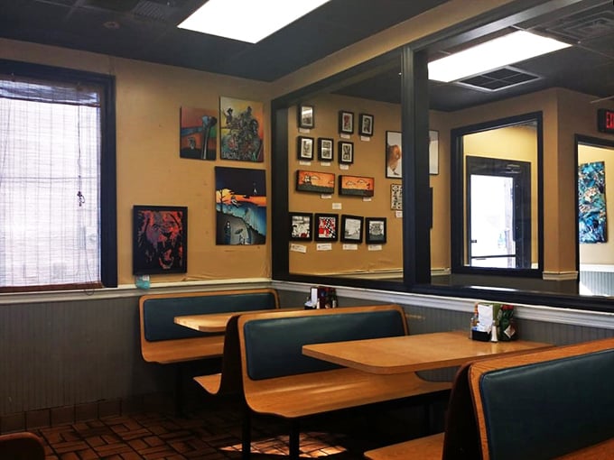 Where every seat tells a story and every wall is a gallery. It's like eating in an art museum, but with better food.
