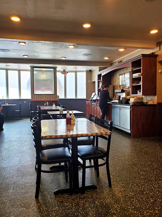 The diner's interior: where every table tells a story and the aroma of bacon writes new chapters.