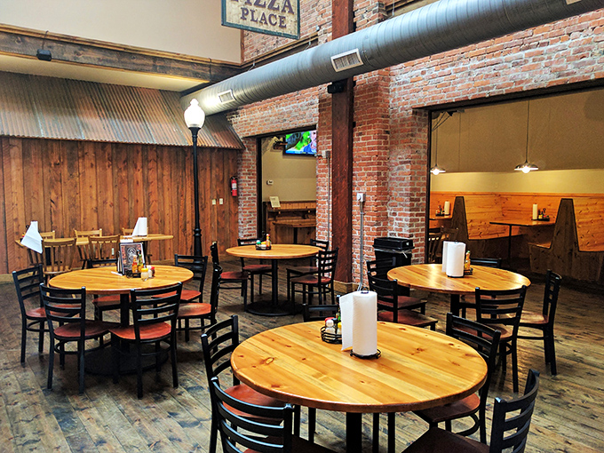 Pizza parlor by day, cozy gathering spot by night. With exposed brick and warm wood, it's like dining in your coolest friend's loft.