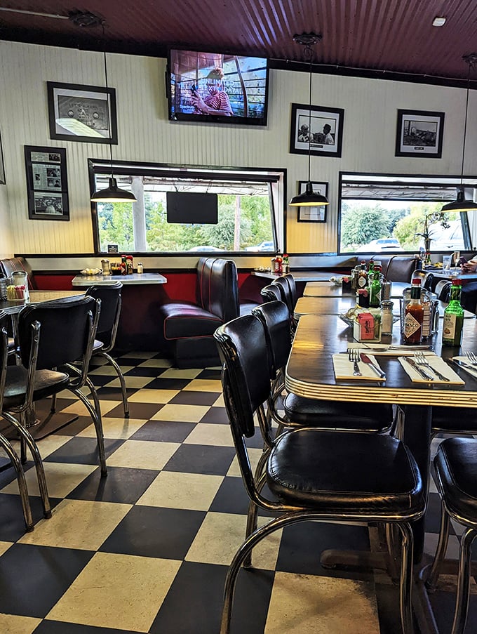Black and white checkered floors, red accents, and pendant lights &ndash; the holy trinity of classic American diner design.