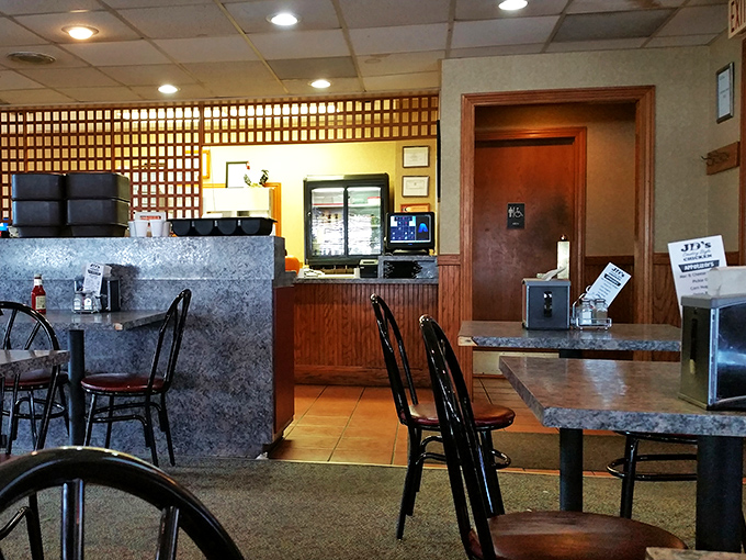 The counter where magic happens and calories don't count. Notice the wood lattice divider&mdash;architectural proof you're in a true classic.