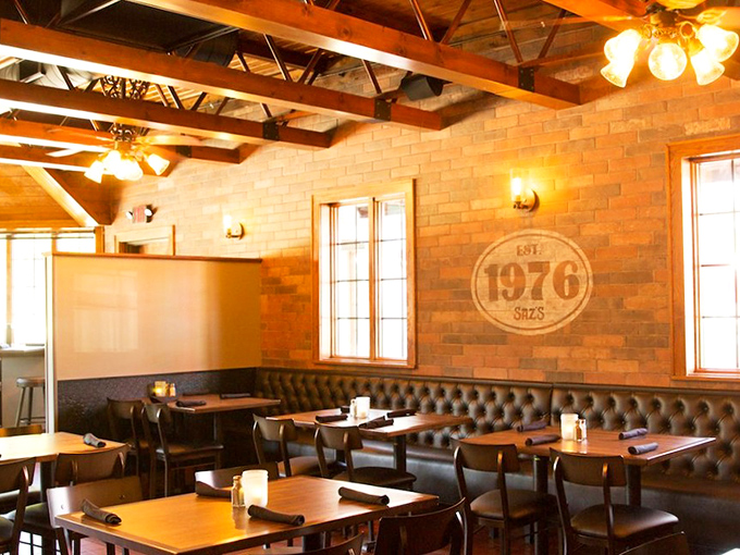 Exposed beams, cream city brick, and that "EST. 1976" emblem&mdash;not just decor, but a promise that you've found somewhere authentically Milwaukee.