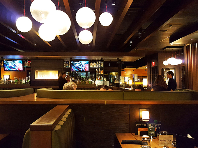 The bar area glows with possibility&mdash;where strangers become friends and friends become slightly louder versions of themselves.