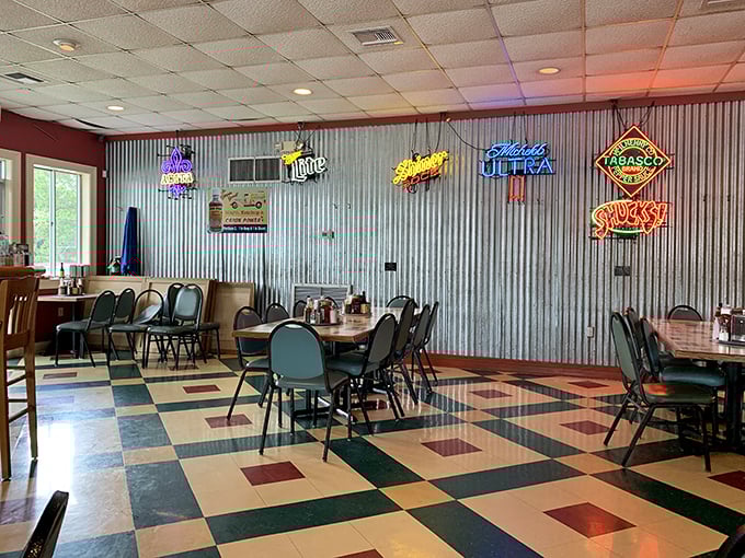 Neon signs, checkered floors, and the promise of seafood galore. It's like your cool aunt's kitchen got a Cajun makeover!