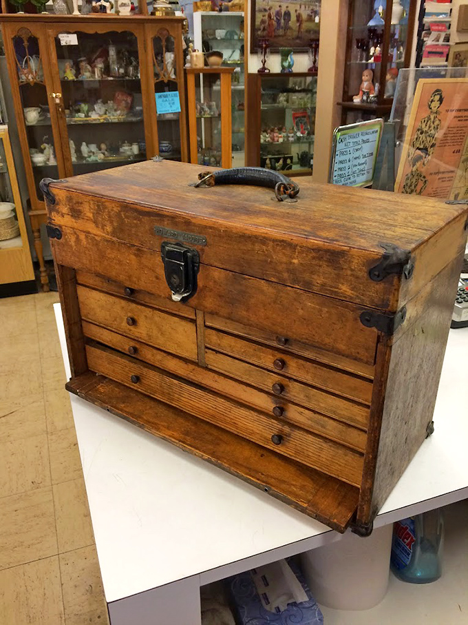 This isn't just a toolbox &ndash; it's a wooden wonder of workmanship! Imagine the stories hidden in those well-worn drawers.
